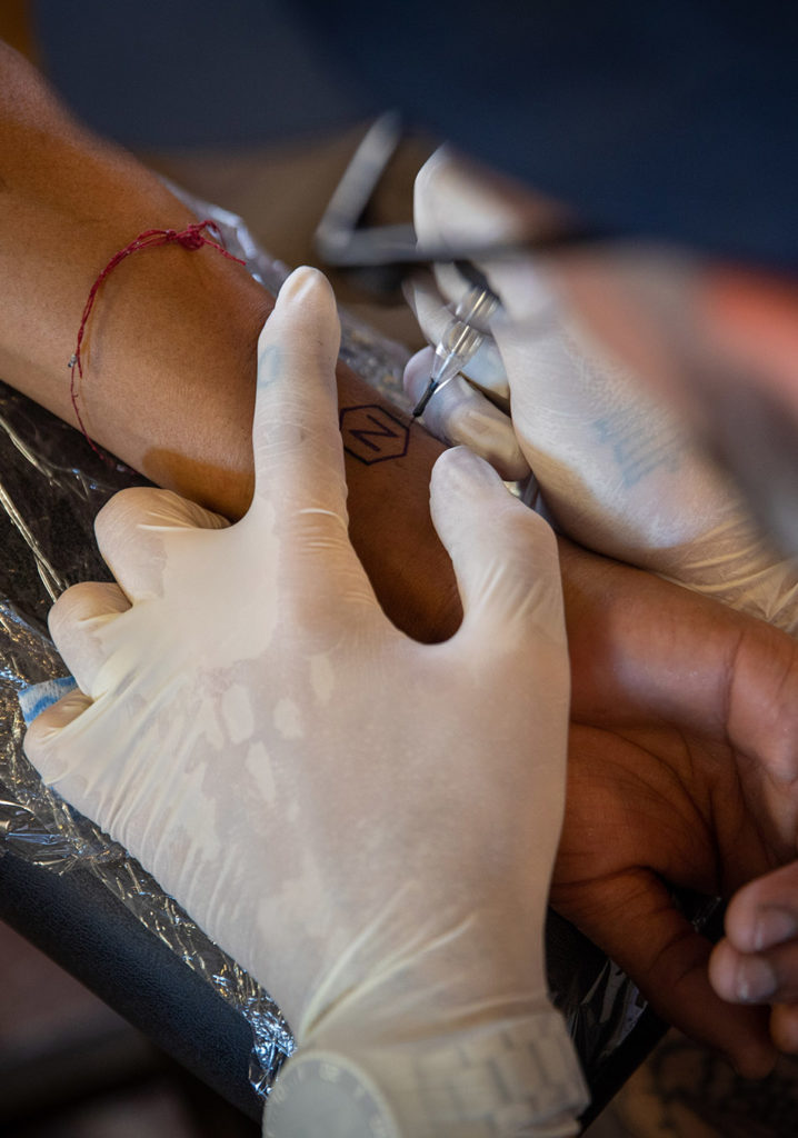 Getting a tattoo – Human Rights Tattoo